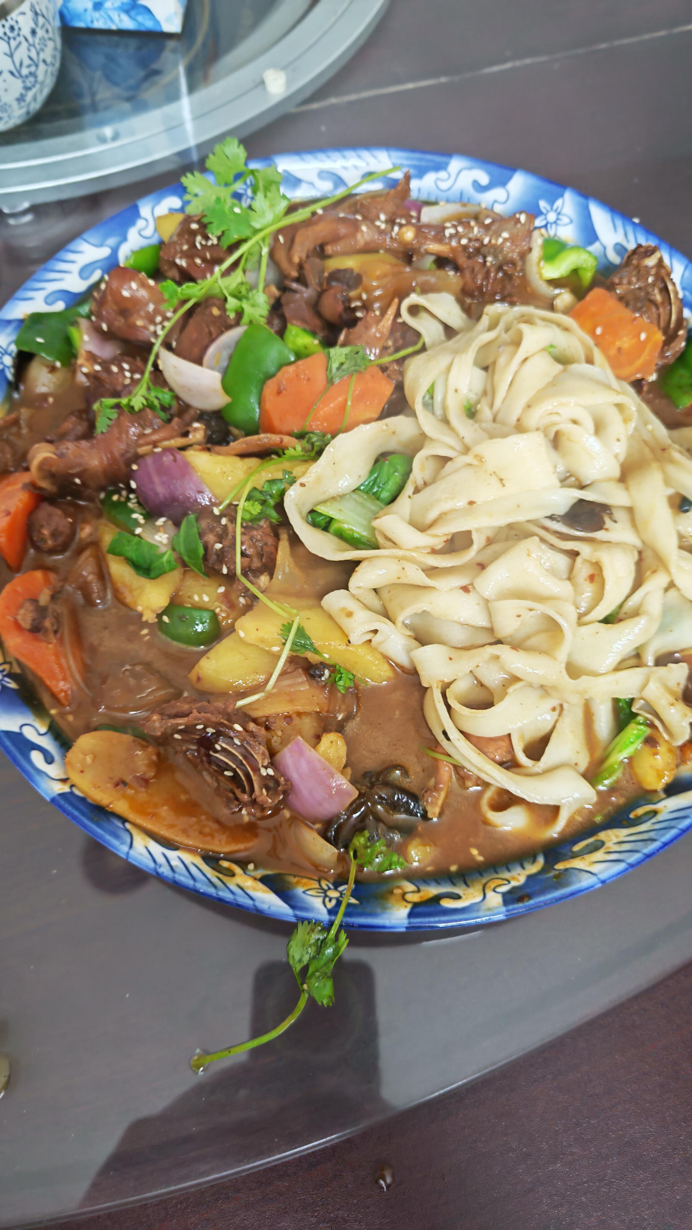 Spicy Braised Chicken in a Large Pot · Let's Master English